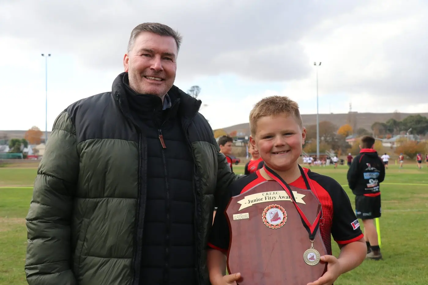 Juniors embrace large crowds, festive occasion
